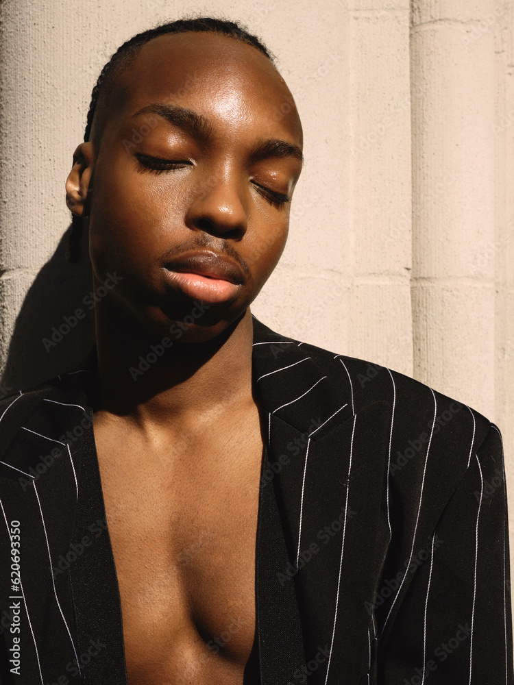 Feminine Young Black Man Genderless Stock Photo | Adobe Stock