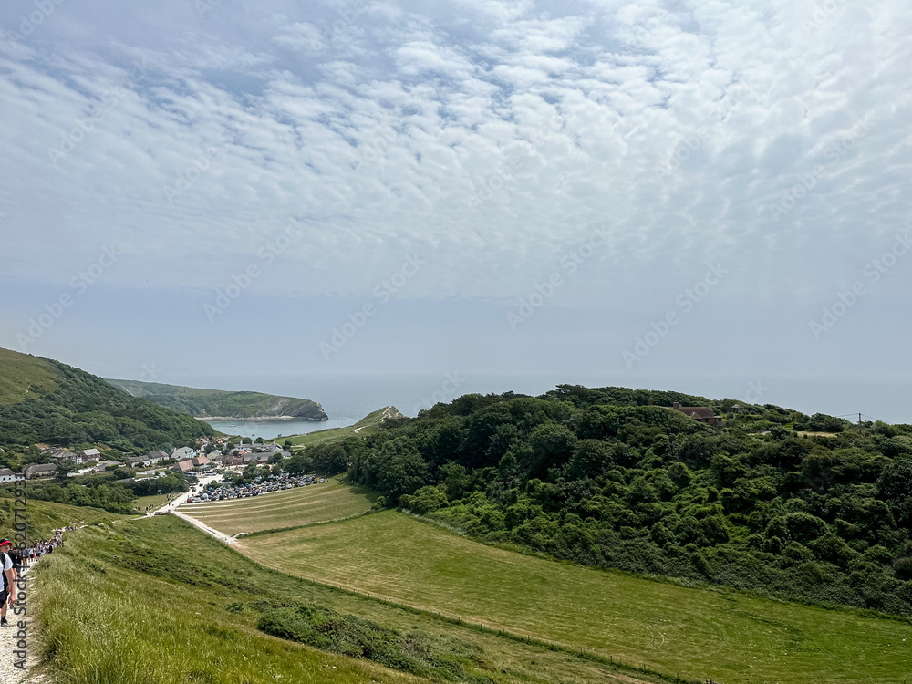 Lulworth Cove bay in Dorset, England, UK. Lulworth Cove and beach view ...