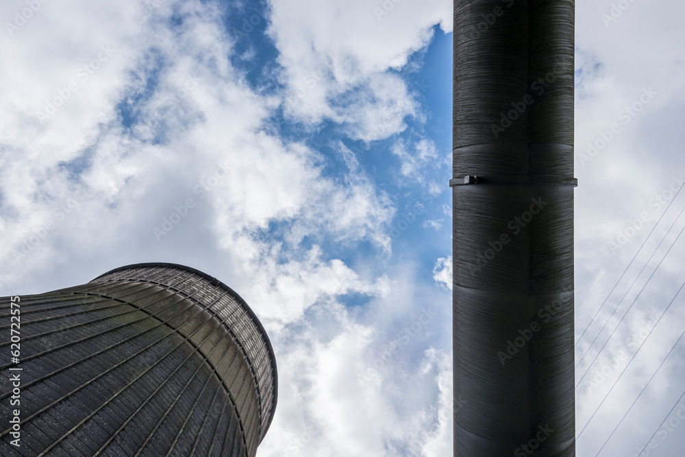 big cooling tower and gas pipeline of an abandoned power plant Stock ...