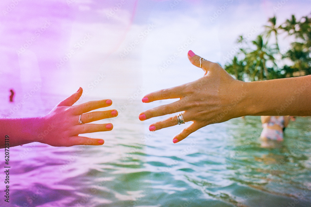 two hands in ocean Stock Photo | Adobe Stock