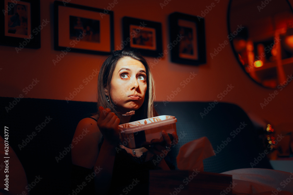 Stressed Woman Eating Ice-Cream at Night. Unhappy woman eating her ...
