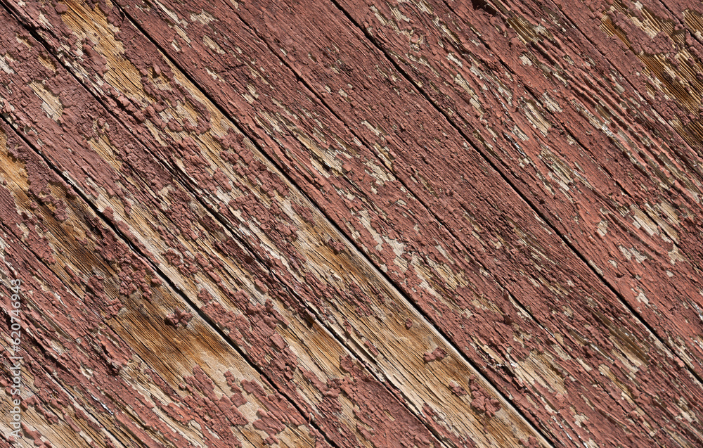 Old wood texture background shows a diagonal pattern. Red brown barn ...