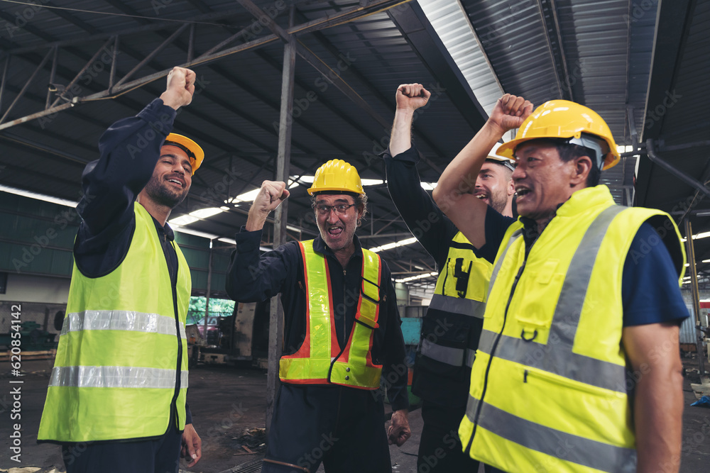Group of male factory workers standing and show their hands after ...