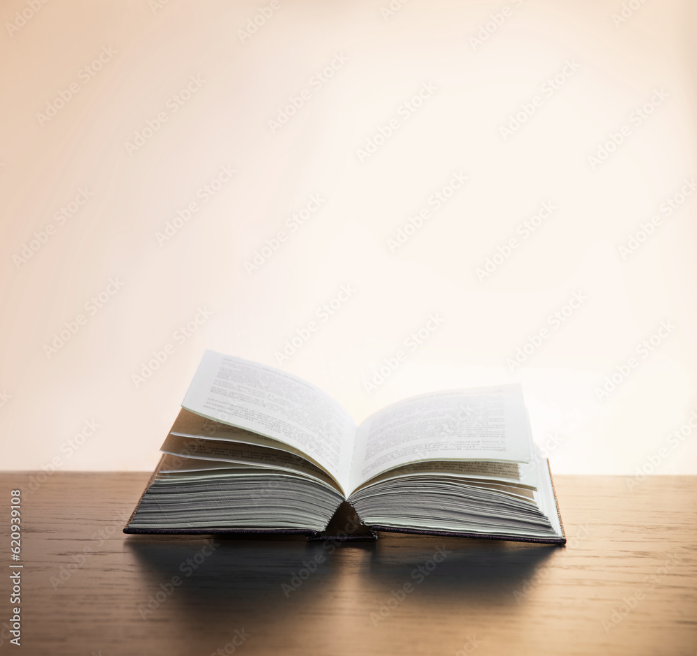 Open book on white background Stock Photo | Adobe Stock