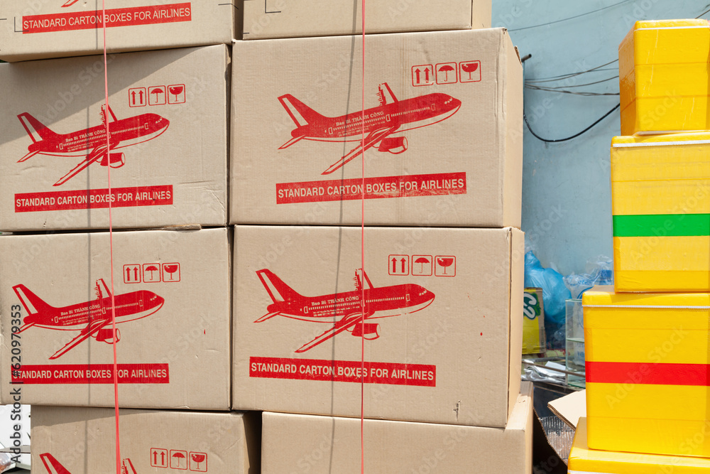 Ho Chi Minh City, Vietnam - May 22, 2023: Stacks of cardboard and ...