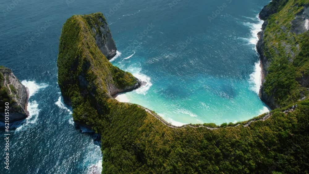 Mountain coast on Nusa Penida island with sandy Kelingking beach in ...