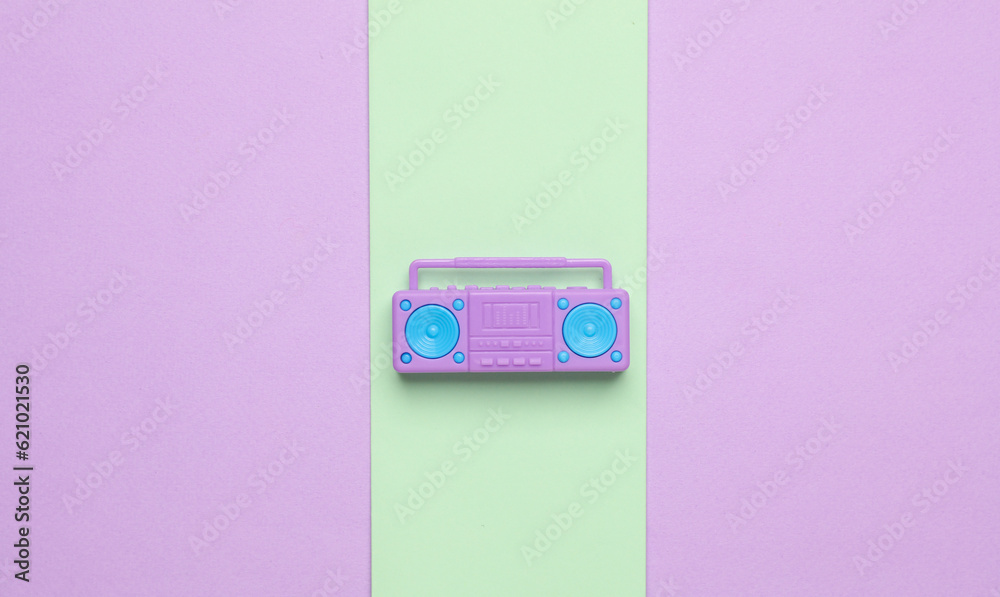 Miniature boombox audio tape recorder on a pastel background Stock ...