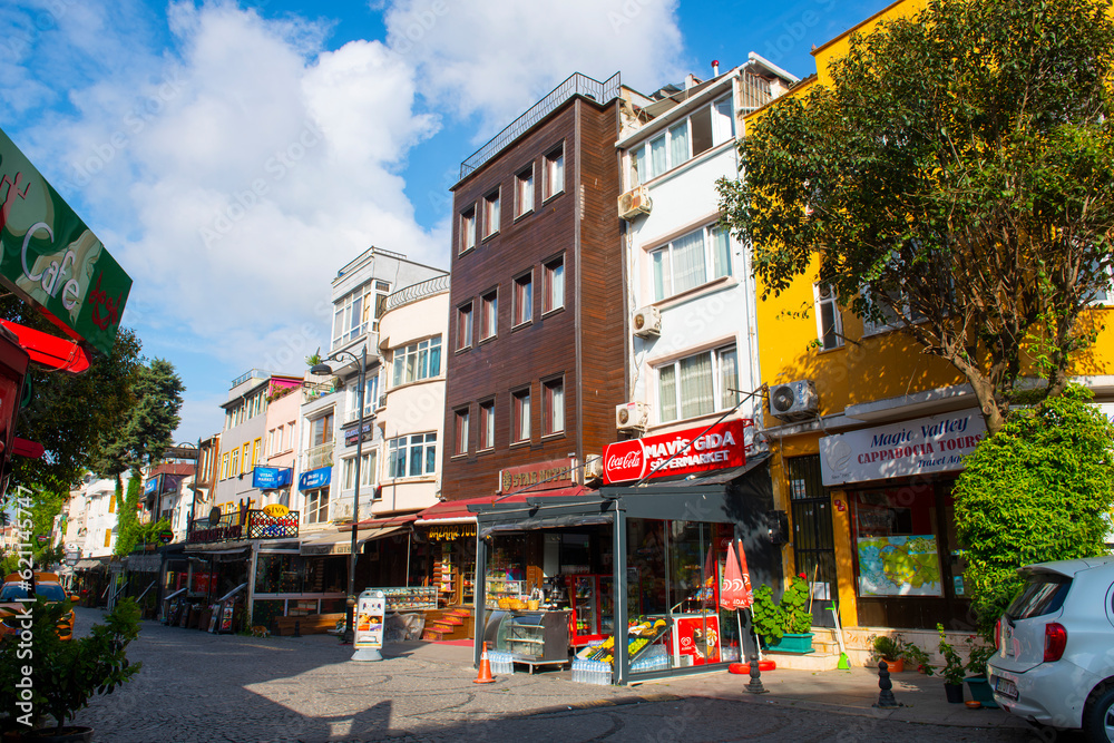 Historic commercial buildings on Akbiyik Caddesi Street in Sultanahmet ...