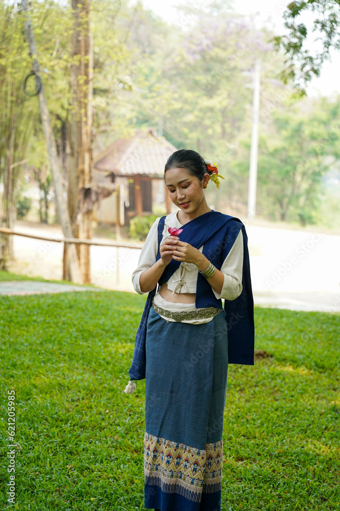 Portrait of Beautiful rural Thai woman wear Thai northern traditional ...