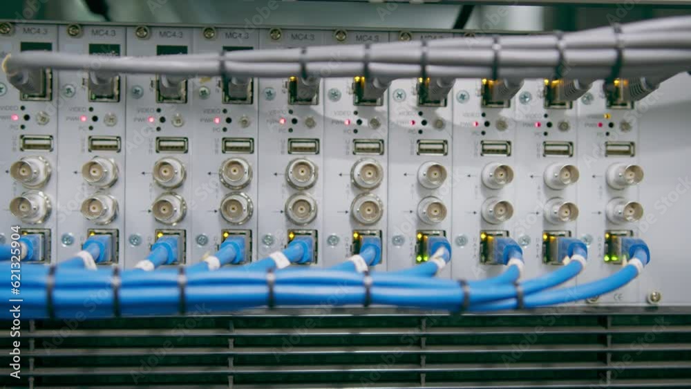 close-up of a pile of network patch cables in a server room in a data ...