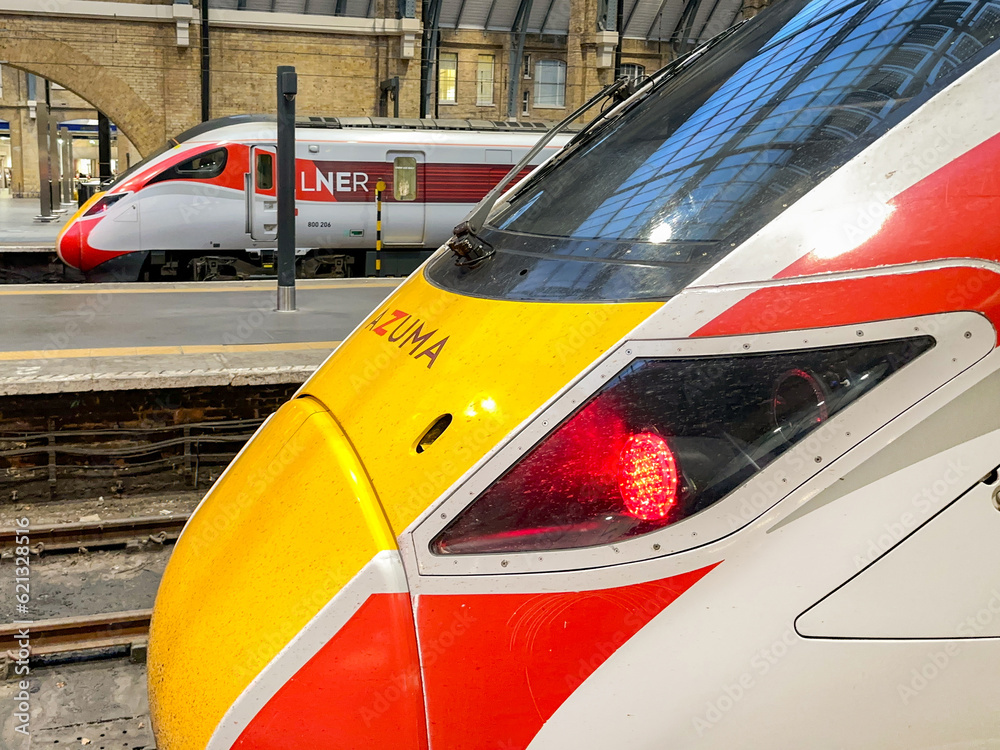 London, England, UK - 27 June 2023: High speed train alongside one of ...