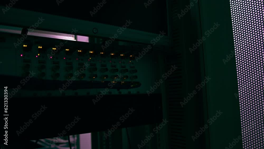close-up of a pile of network patch cables in a server room in a data ...
