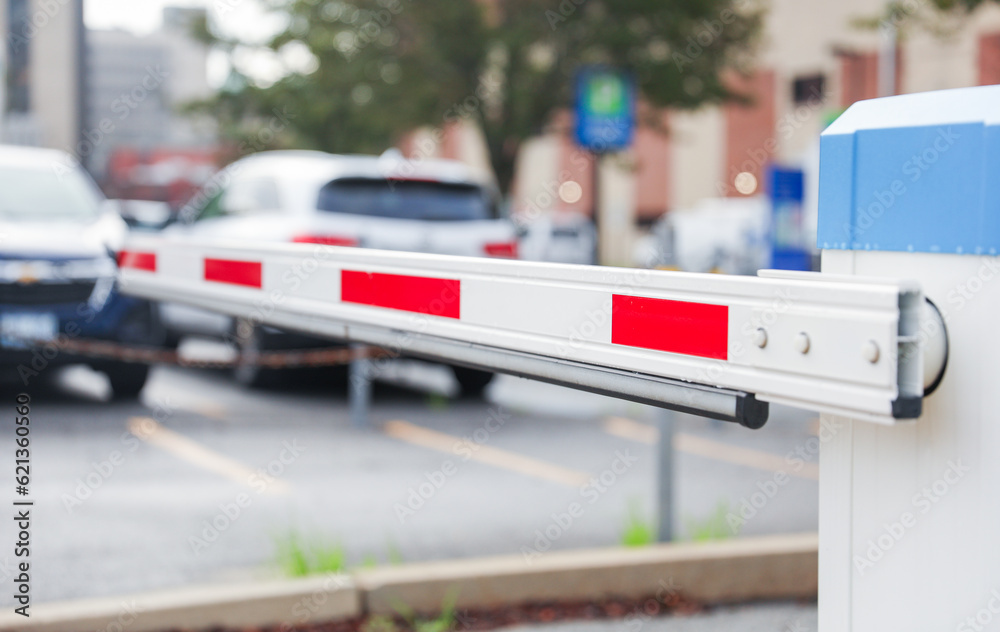 closed parking lot gate symbolizing restriction, boundaries, and ...