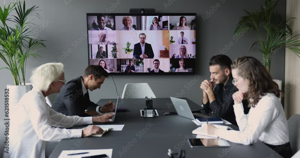 Group of interns watching educating training, learning webinar in ...