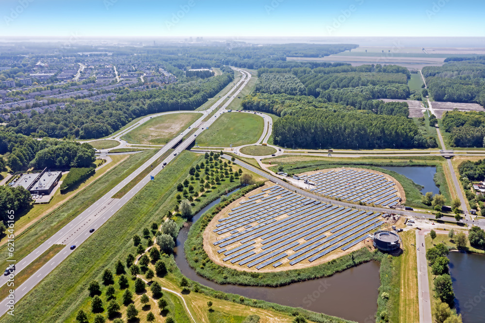 Aerial from a solar Panel Farm with unique design in a form of an ...