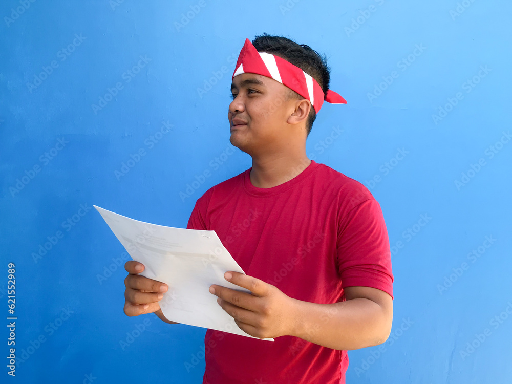 Beautiful Asian man giving salute celebrate Indonesian independence day ...
