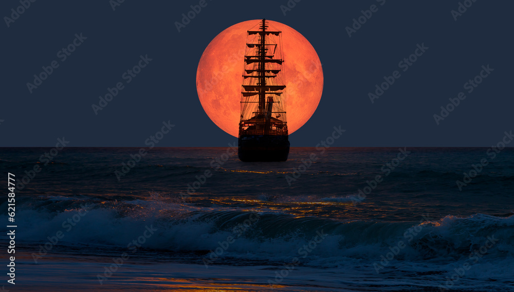 Sailing old ship in storm sea - Night sky with moon in the clouds ...