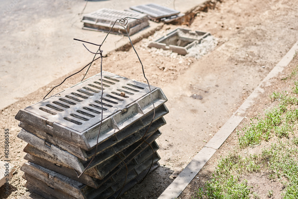 Laying concrete manholes and drain pipes for stormwater system ...