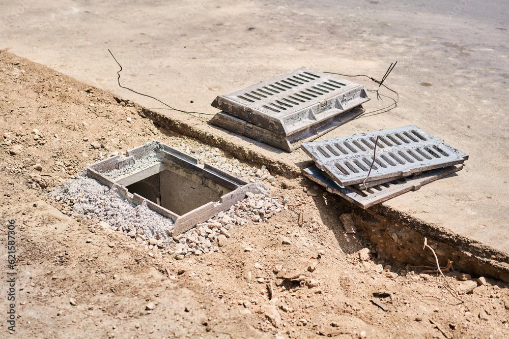 Laying concrete manholes and drain pipes for stormwater system ...