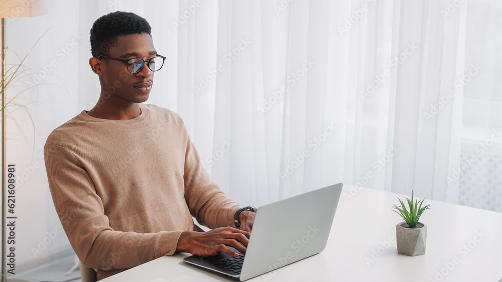 Computer work. Task focus. Concentrated developer. Serious business man employee typing on ...