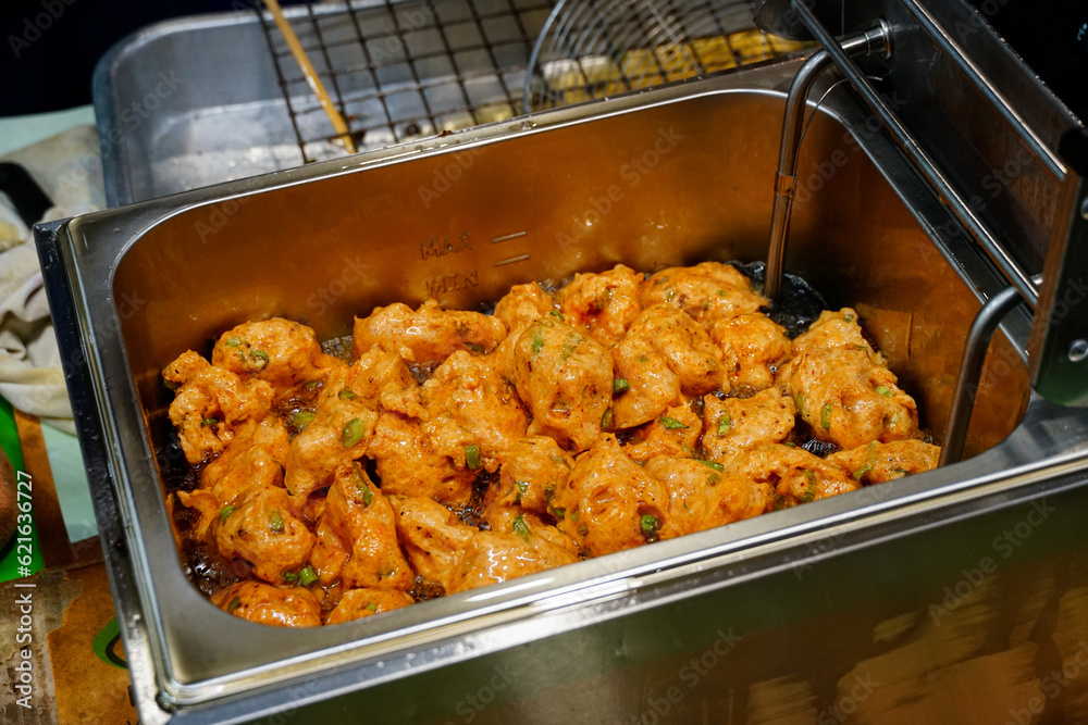 Deep-fried fish cakes, fish mixed with squid, kaffir lime leaves, green ...