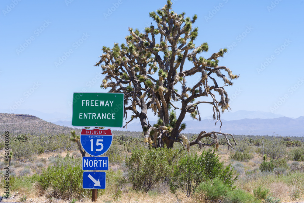 Interstate I-15 entrance sign shown in the Mojave Desert against a ...
