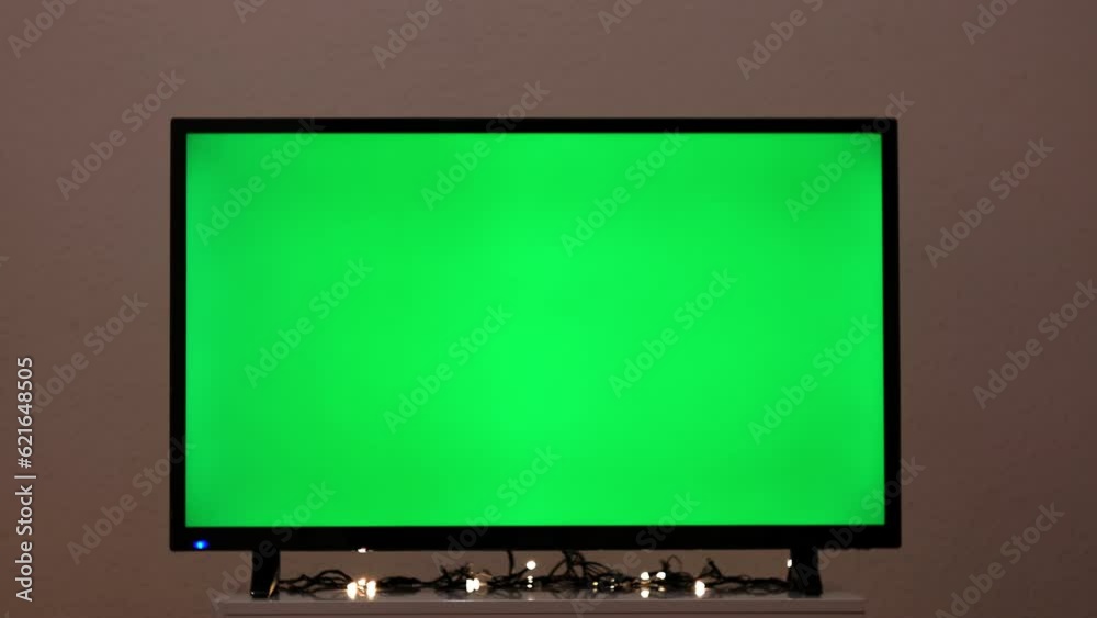 Green TV screen with flashing garland. Concept. Garland flashes on ...