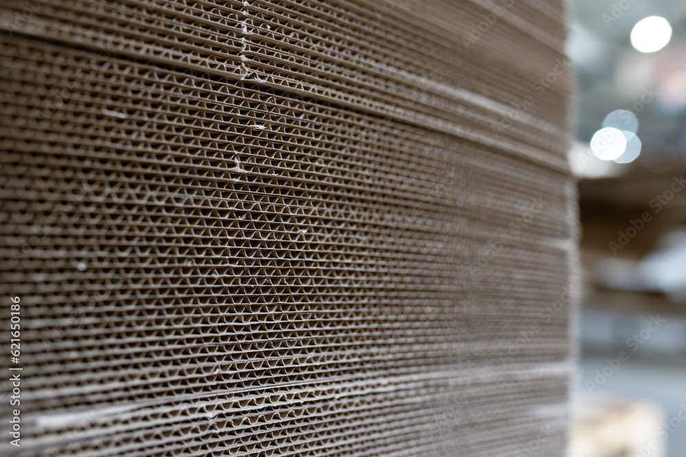 A cardboard sheets in stack. Perforated sheets of corrugated cardboard ...
