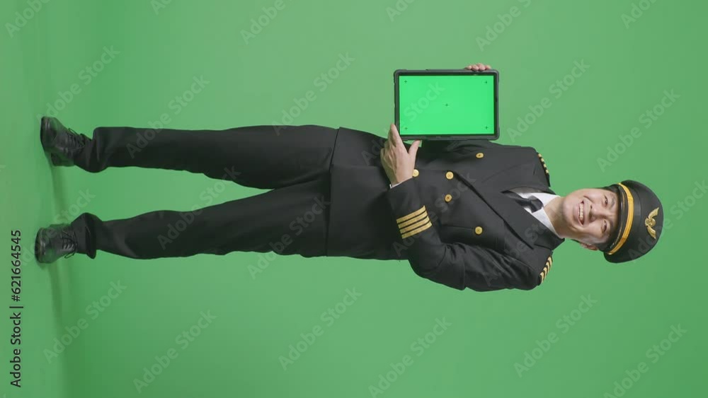 Full Body Of Asian Man Pilot Smiling And Showing Green Screen Tablet To ...