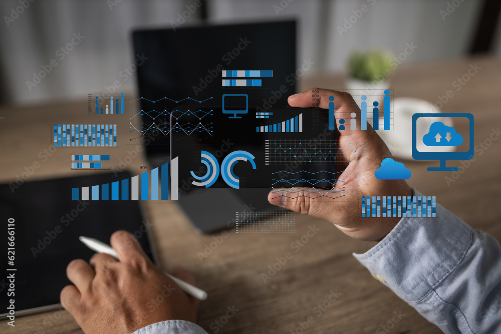 analyzing on a laptop Showing business analytics dashboard technology ...