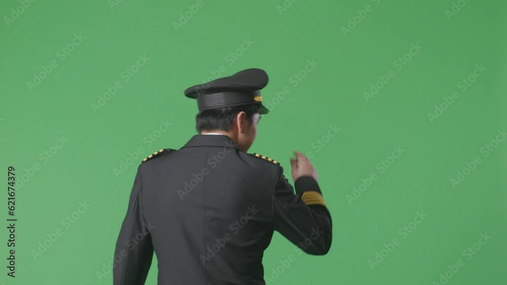 Back View Of Asian Man Pilot Walking And Greeting In The Green Screen ...