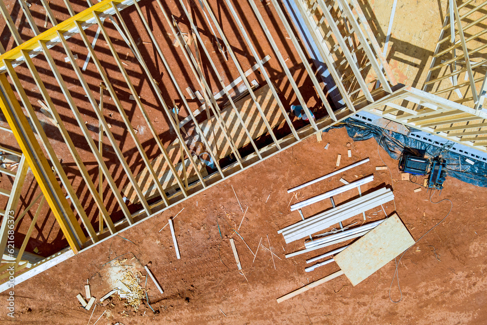 Construction site during framework new residential house with wooden ...