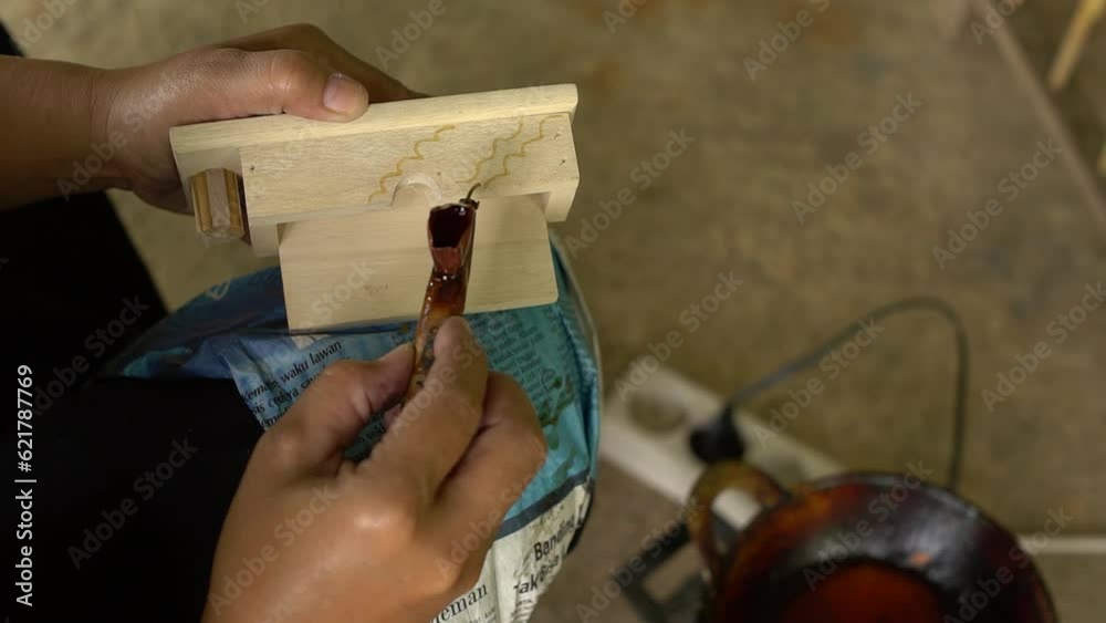 Batik application on accessories box decoration with wood material ...