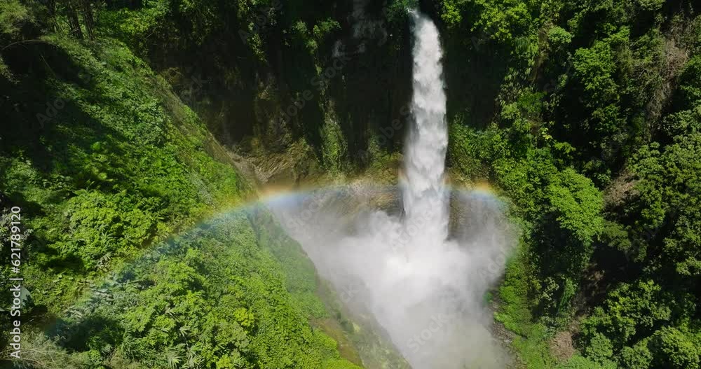 Rainbow over the waterfalls in mountain. Seven Falls. Lake Sebu ...
