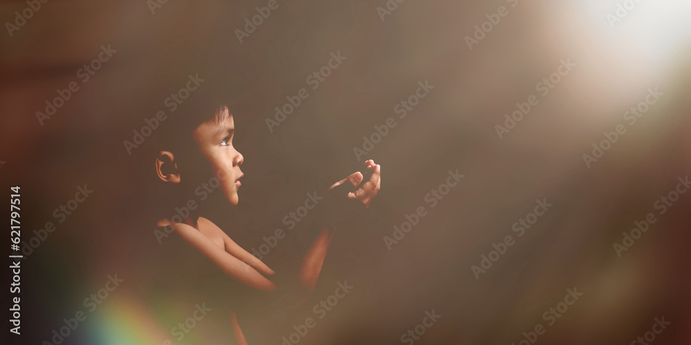Portrait of praying boy on dark background Stock Photo | Adobe Stock