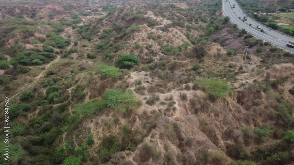 Unique gully erosions of the iconic badlands of Chambal ravines next to ...