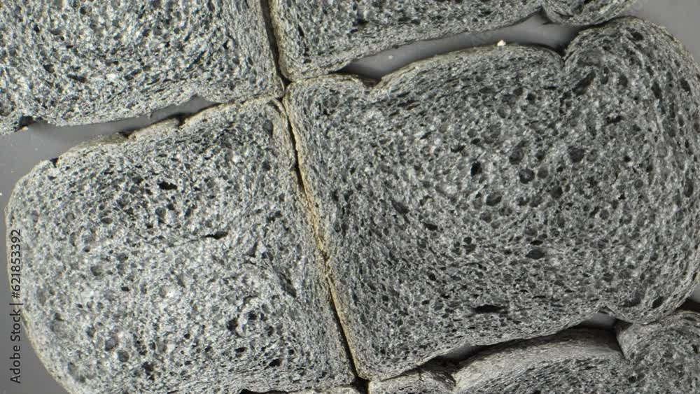 Vidéo Stock Soft Charcoal Bread: A unique culinary creation that ...
