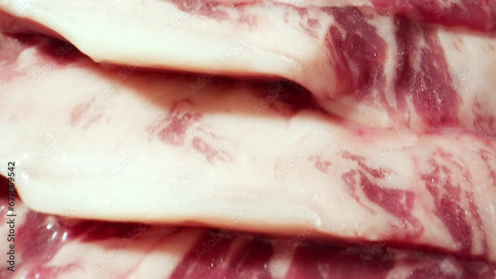 Macro footage of vacuum-packed frozen dry-aged beef. Witness the ...