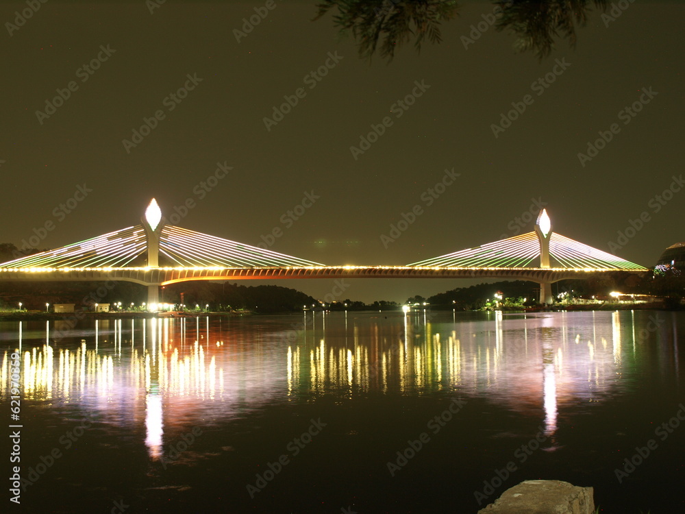 A Night View of the The Durgam Cheruvu Cable Bridge of city skyline and ...