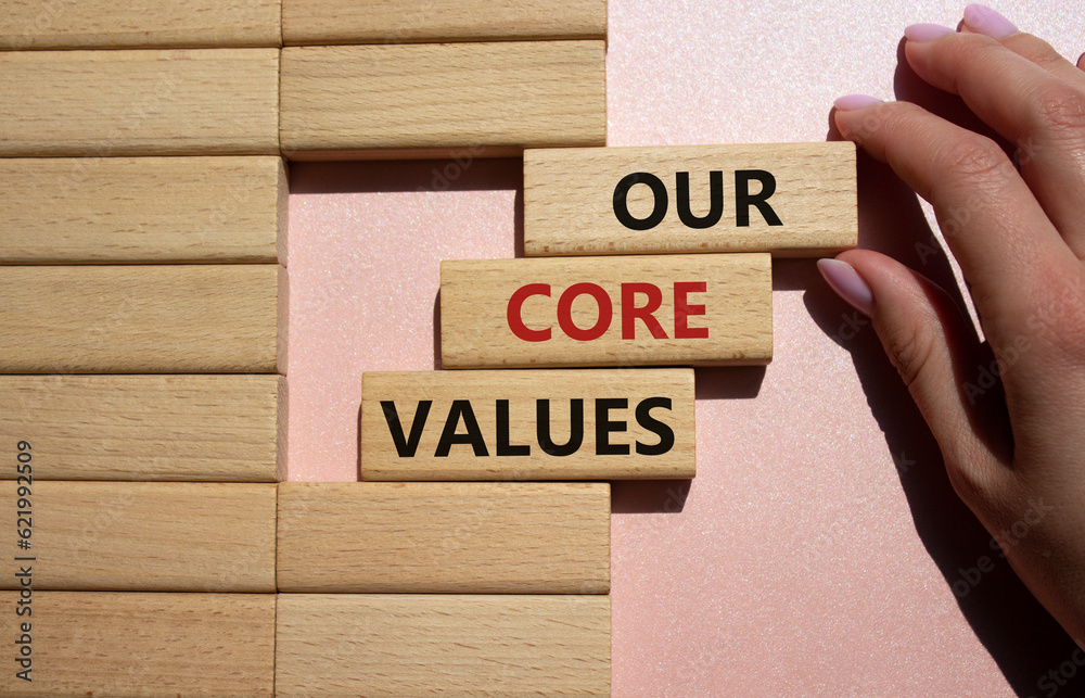 Our core values symbol. Concept words Our core values on wooden blocks ...
