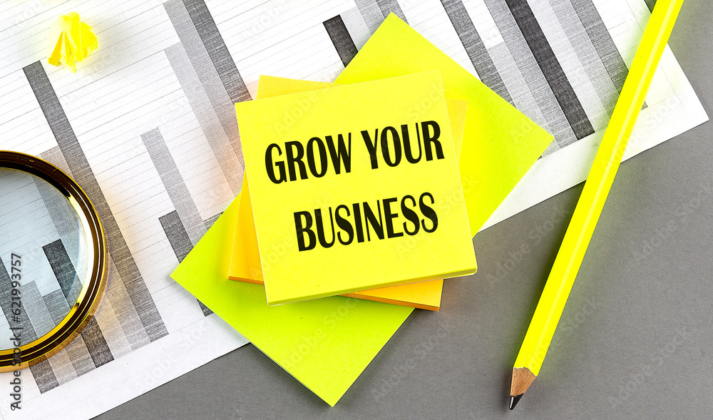 GROW YOUR BUSINESS text on sticky on sticky on chart with pen Stock ...