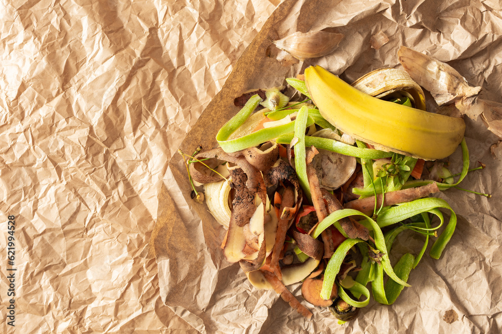 Food organic waste on eco friendly parchment paper, fruit and vegetable ...