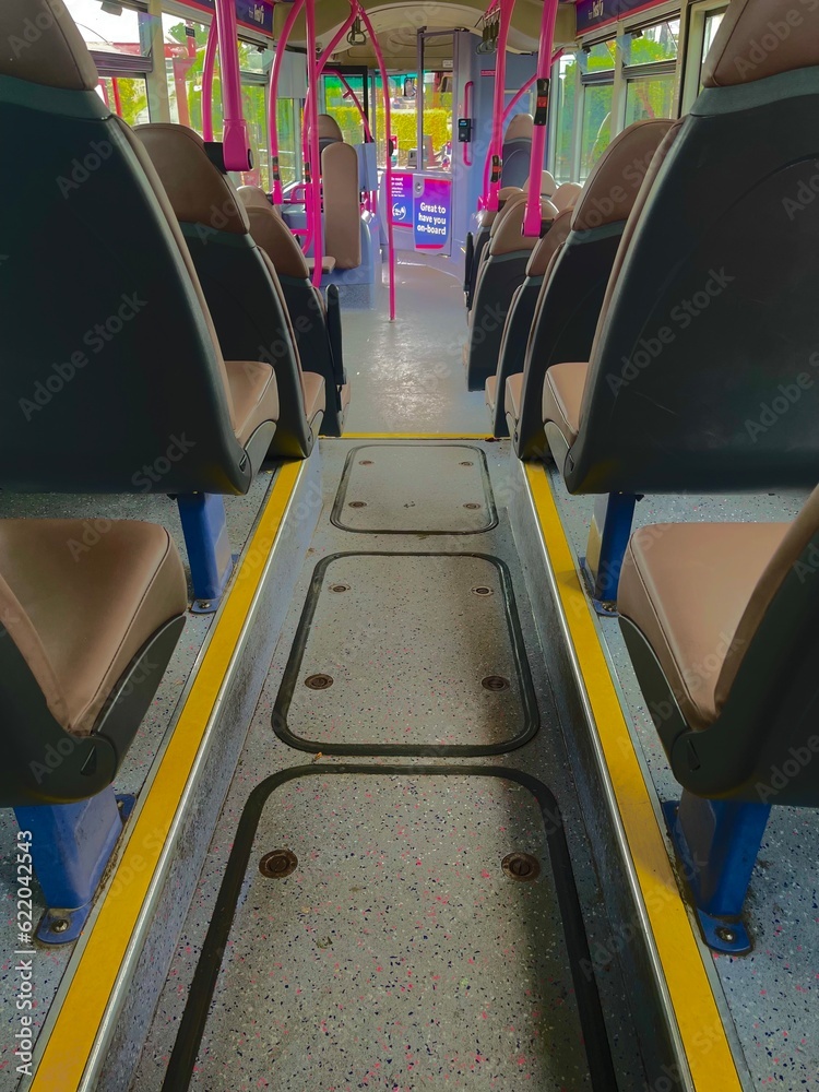 Interior Of Bus UK, England. Inside Of Bus. Floor View, Pink Handles ...
