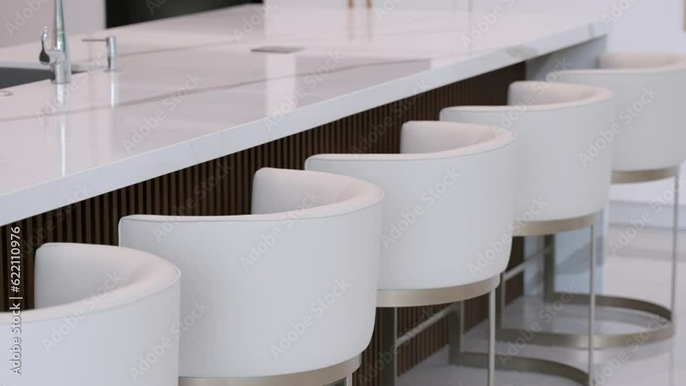 Expansive long countertop from white marble with wooden grid decor ...