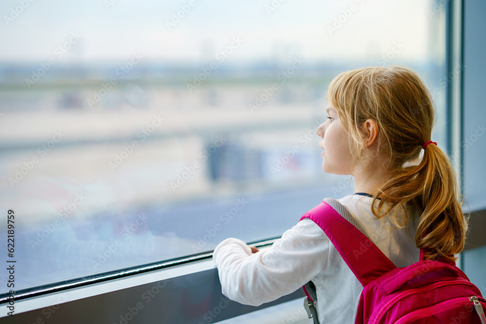 Little Girl at the Airport Waiting for Boarding at the Big Window. Cute ...