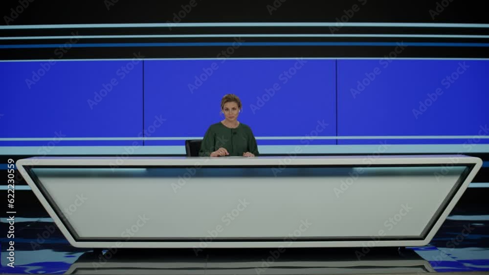 BLUE SCREEN CHROMA KEY Caucasian female anchorwoman reporting on a ...