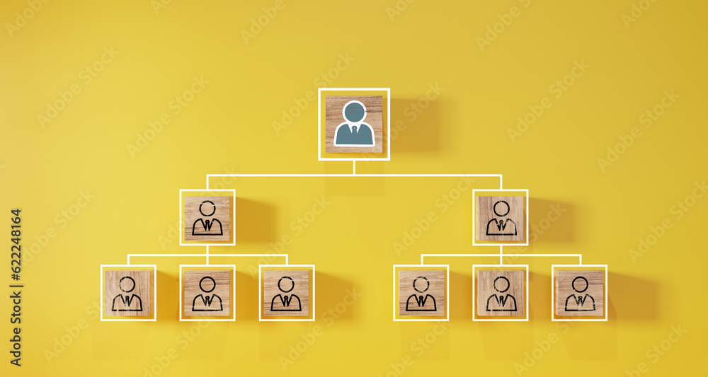 Company hierarchical organizational chart of wooden cubes on yellow ...
