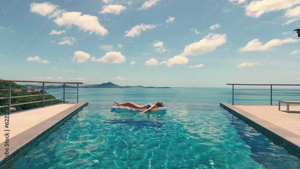 Outdoor lifestyle portrait of young pretty sexy girl swimming with neon ...