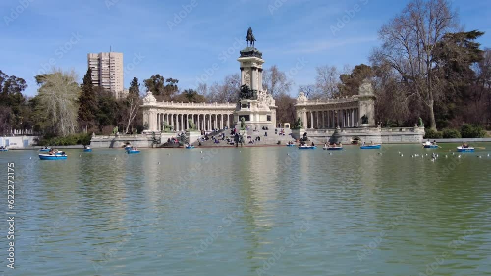 View of the large pond of the Retiro Park. Buen Retiro park boats on ...
