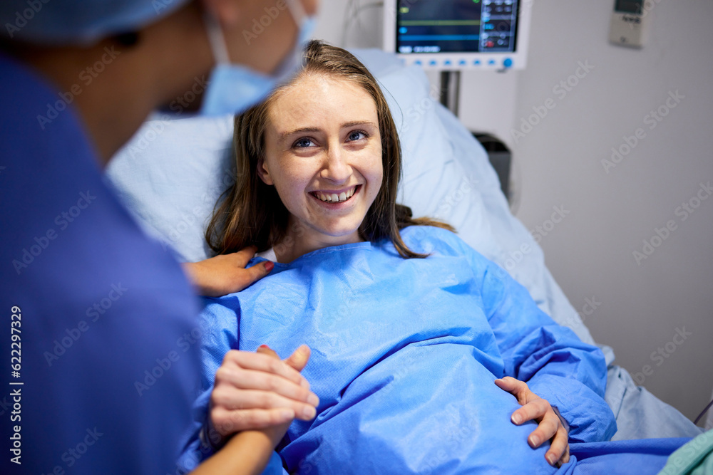 Pregnant woman, labor and hospital with holding hands, bed and support ...